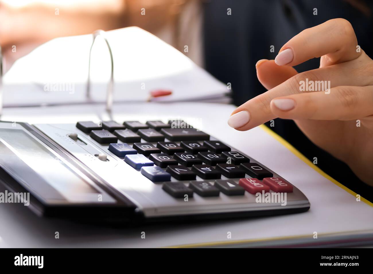 Chartered Accountant Hand Calculating Tax And Salary Stock Photo - Alamy