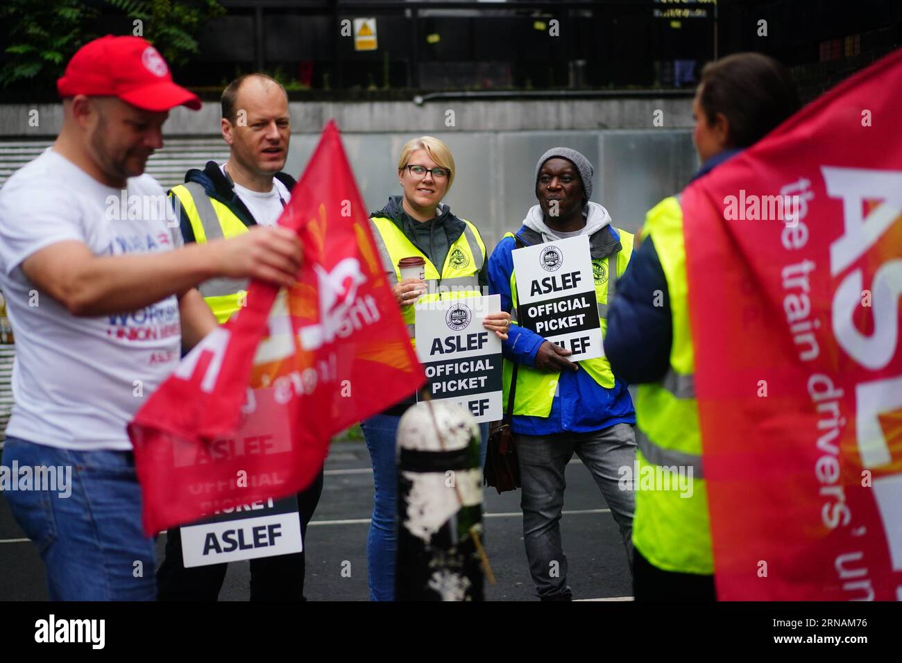 Members of the Aslef union on a picket line at Euston station in London ...