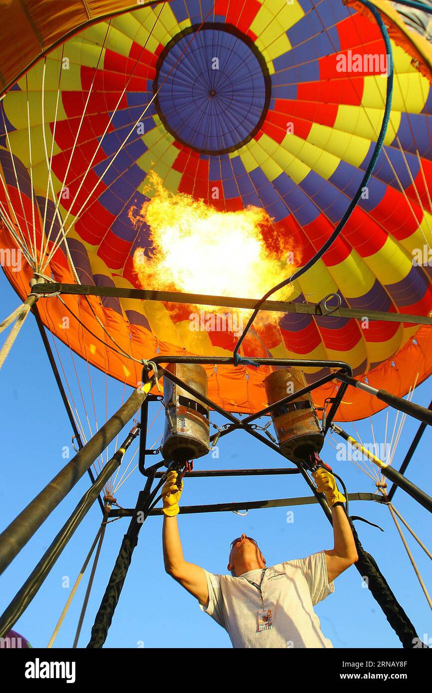 (160211) -- PAMPANGA PROVINCE, Feb. 11, 2016 -- An aviator prepares his ...