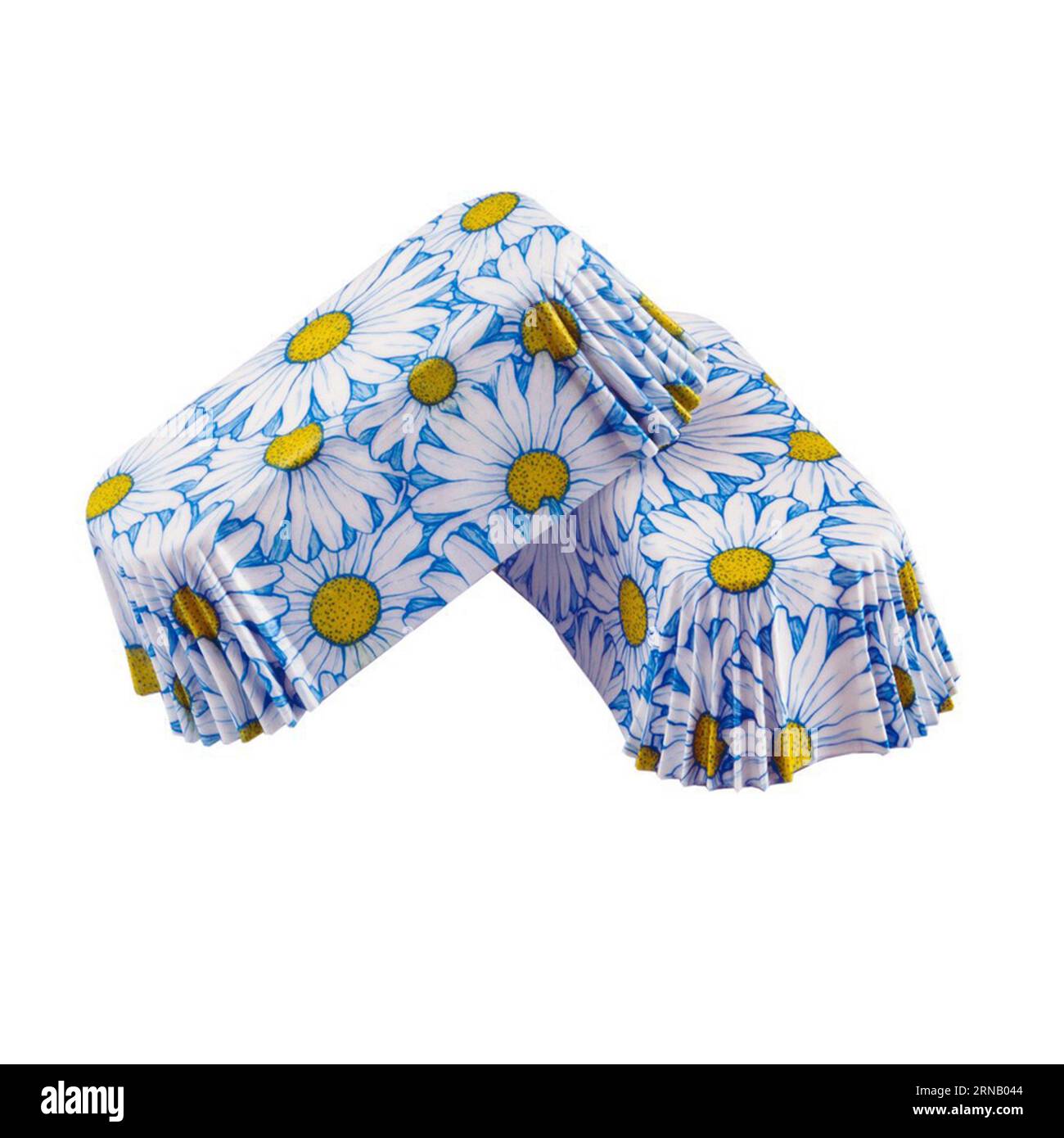 White paper baking forms for cakes with daises pattern isolated over ...