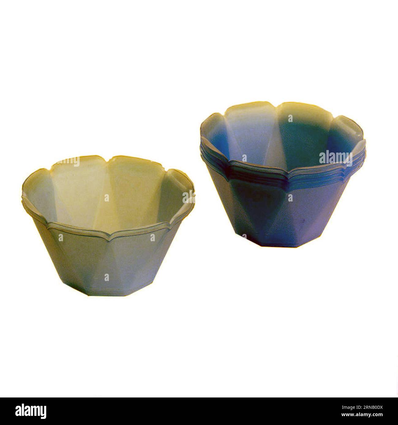 Blue plastic cups isolated over white background, confectionery object ...