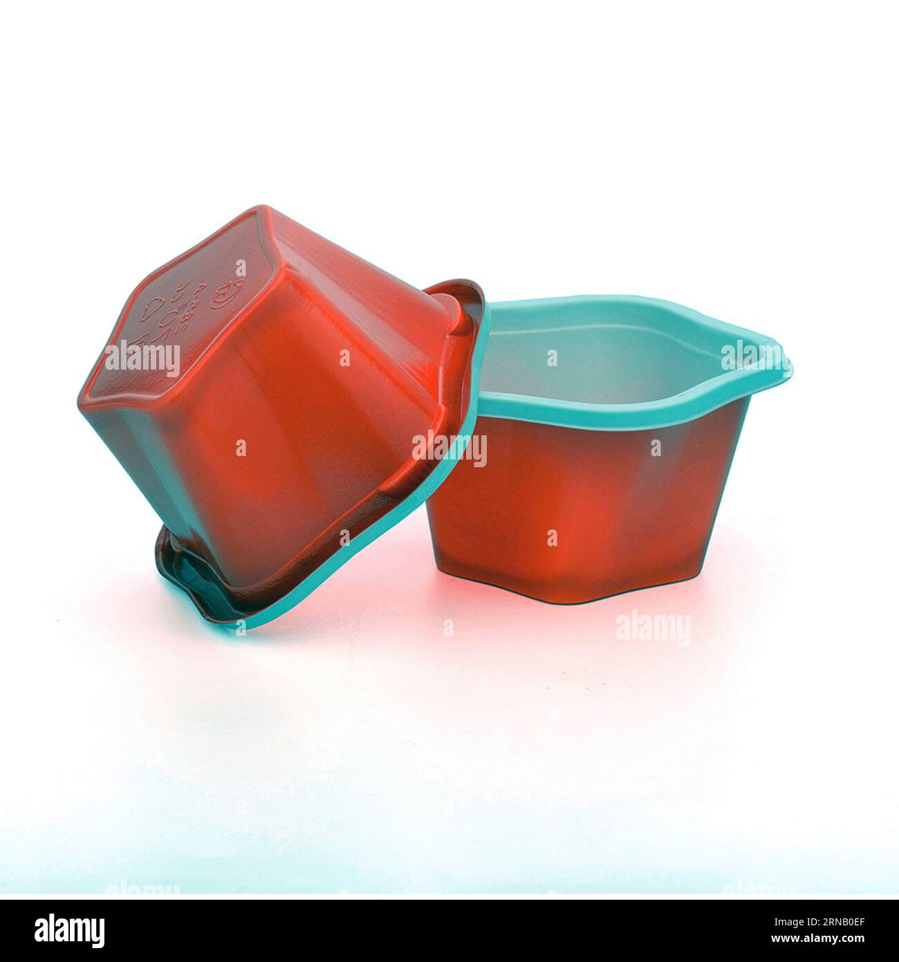 Red plastic cups isolated over white background, confectionery object ...