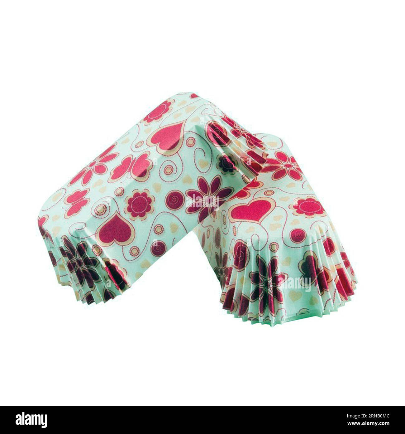 White paper baking forms for cakes with lovely hearts pattern isolated ...