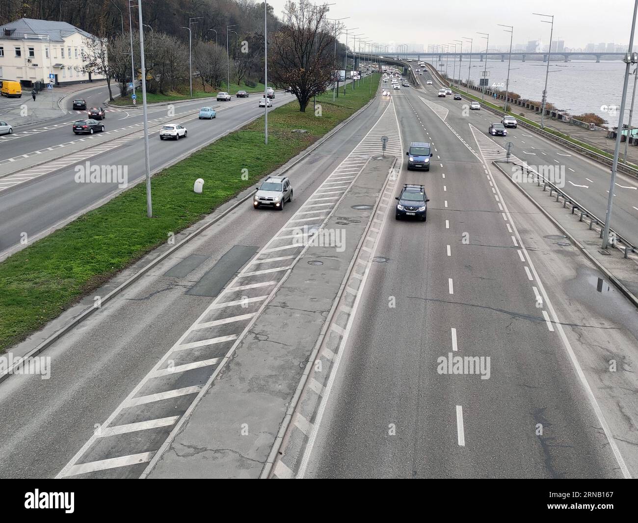 City highway traffic background, cars moving on a freeway during the ...