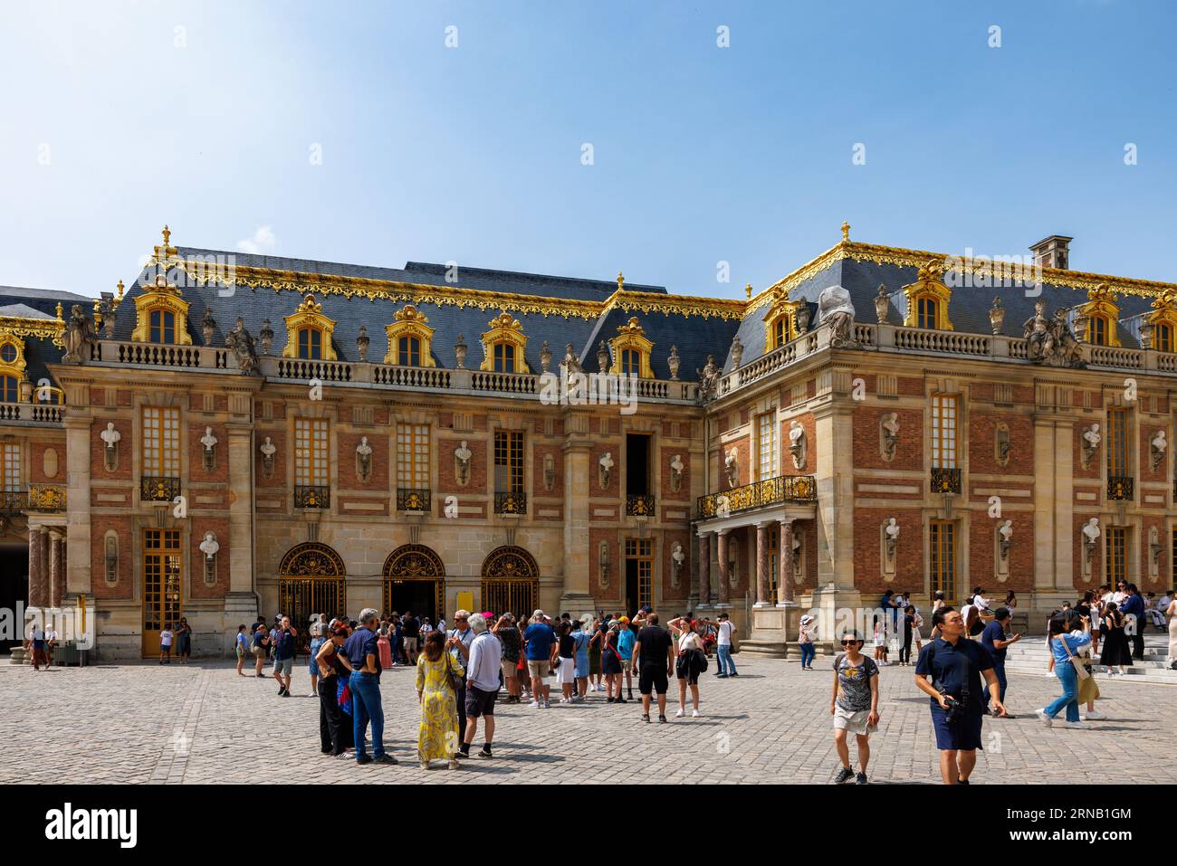 A stunning view of the Royal Courtyard in the Versailles Palace in ...