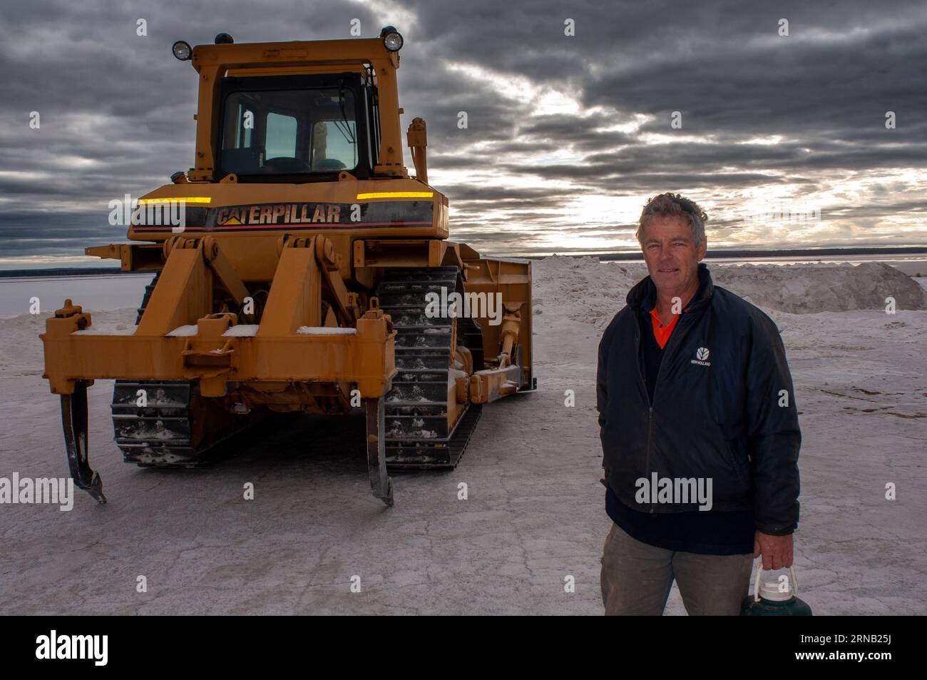 Bulldozer driver with Caterpillar DH7 bulldozer salt mining at WA Salt ...
