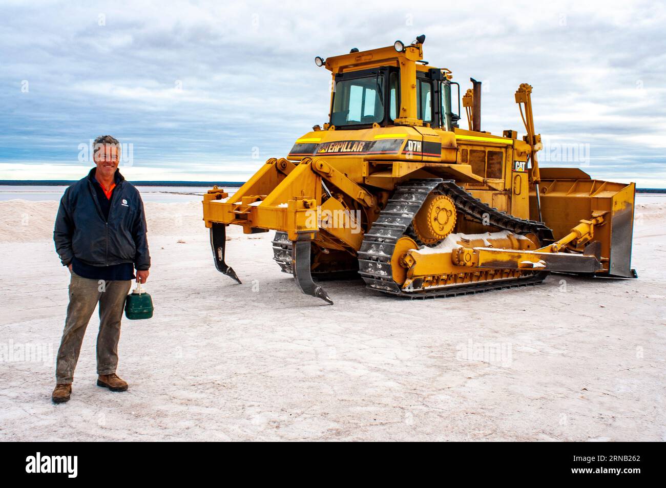 Bulldozer driver with Caterpillar DH7 bulldozer salt mining at WA Salt ...