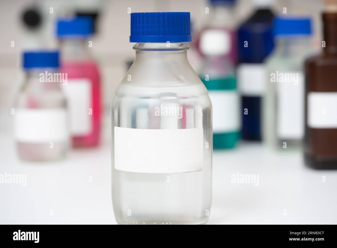 glass bottle with chemicals in biomedical laboratory Stock Photo - Alamy