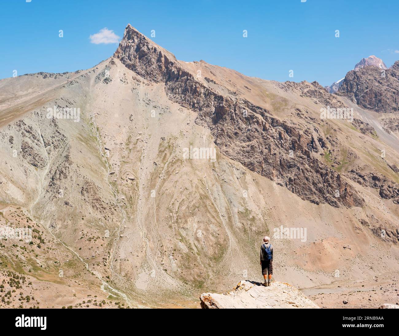 Hiker on rocky mountain background. Fann Mountains, Tajikistan, Central ...