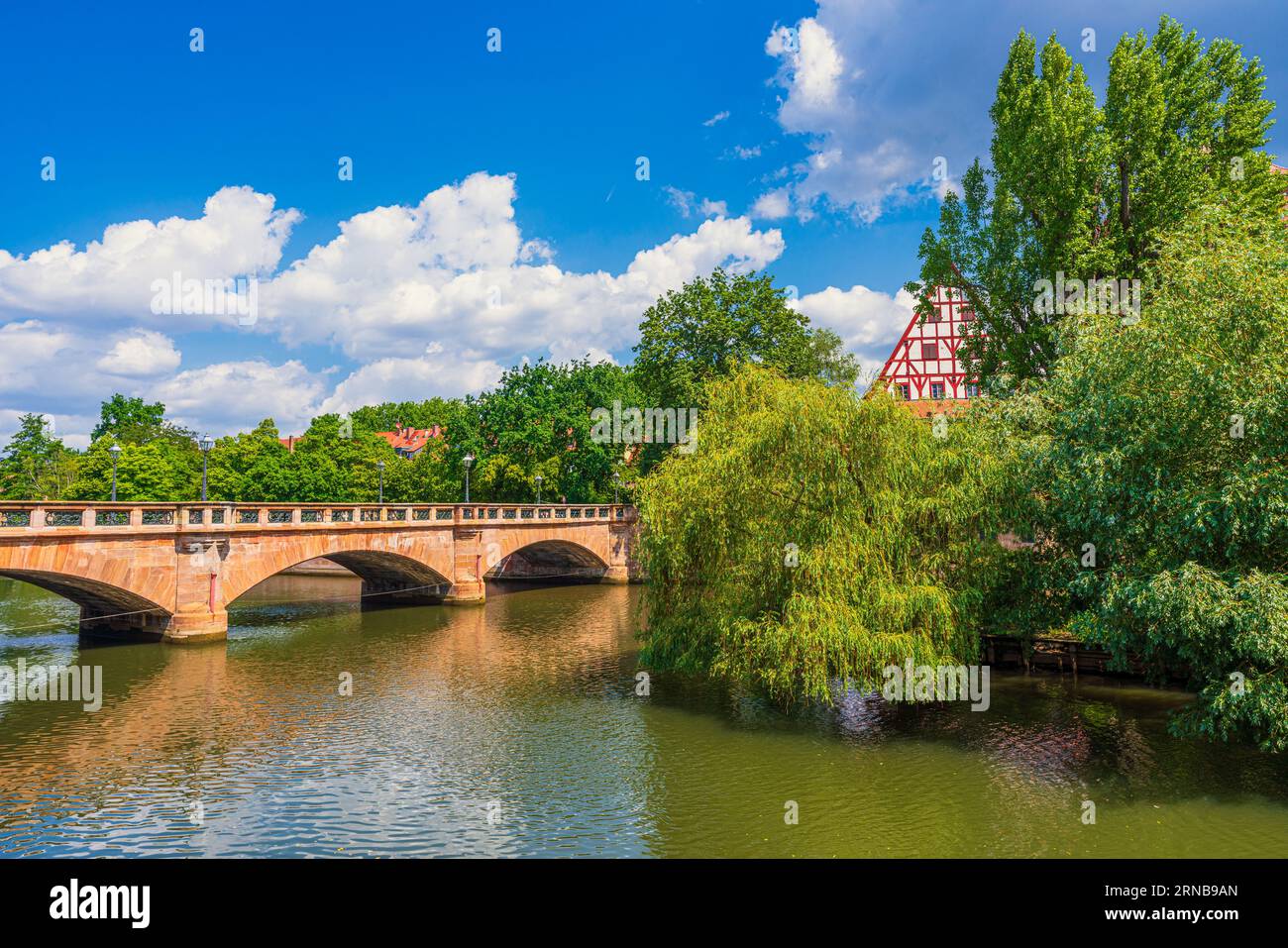 Nuremberg's cityscape features River Pegnitz and Maxbrücke, the oldest ...