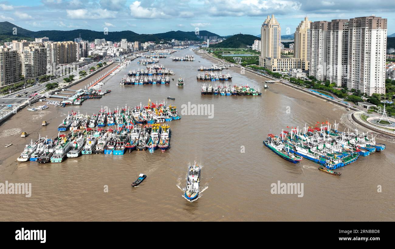 Aerial photo shows fishing boats taking shelter from the approaching ...