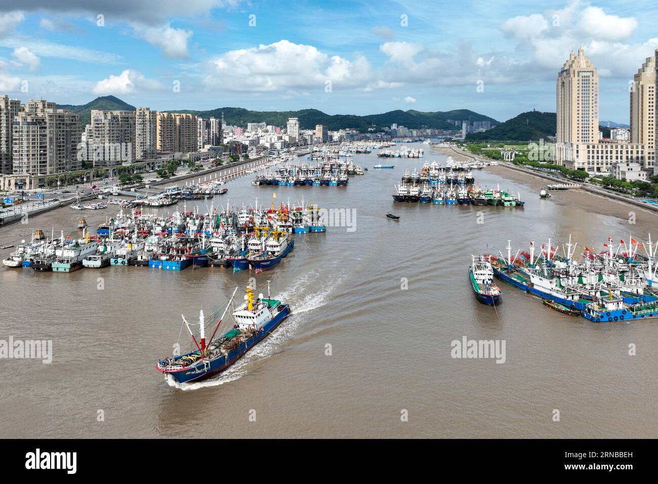 Aerial photo shows fishing boats taking shelter from the approaching ...