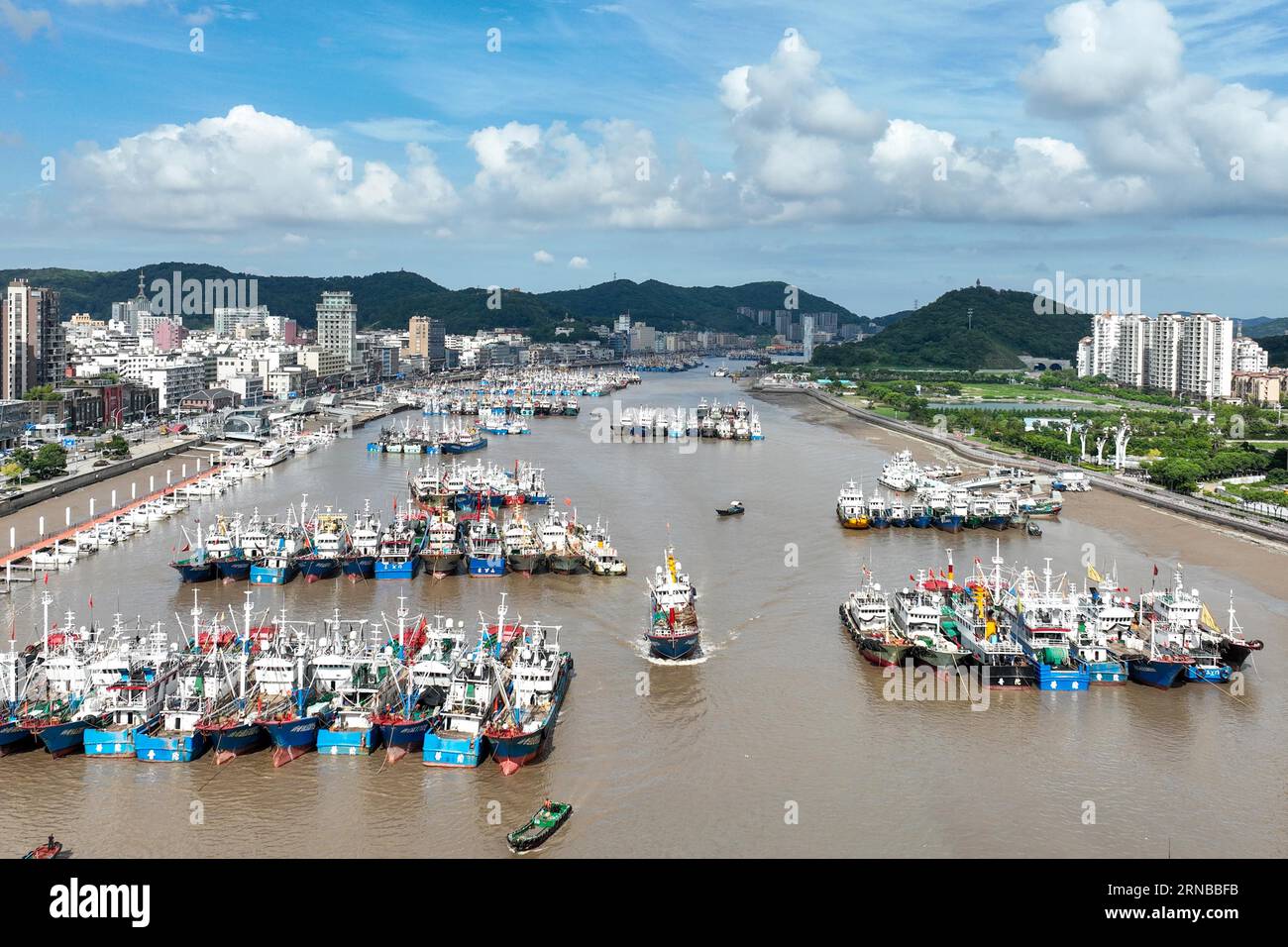 Aerial photo shows fishing boats taking shelter from the approaching ...