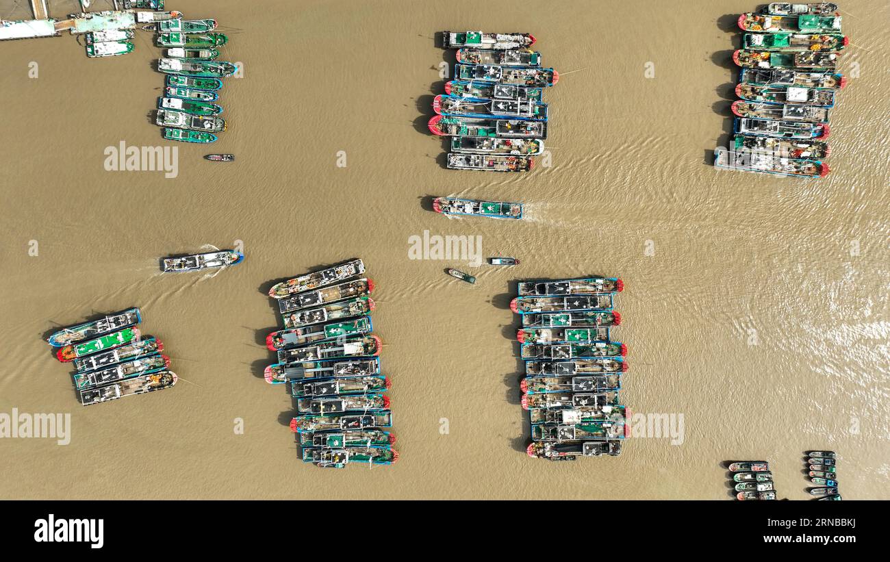 Aerial photo shows fishing boats taking shelter from the approaching ...