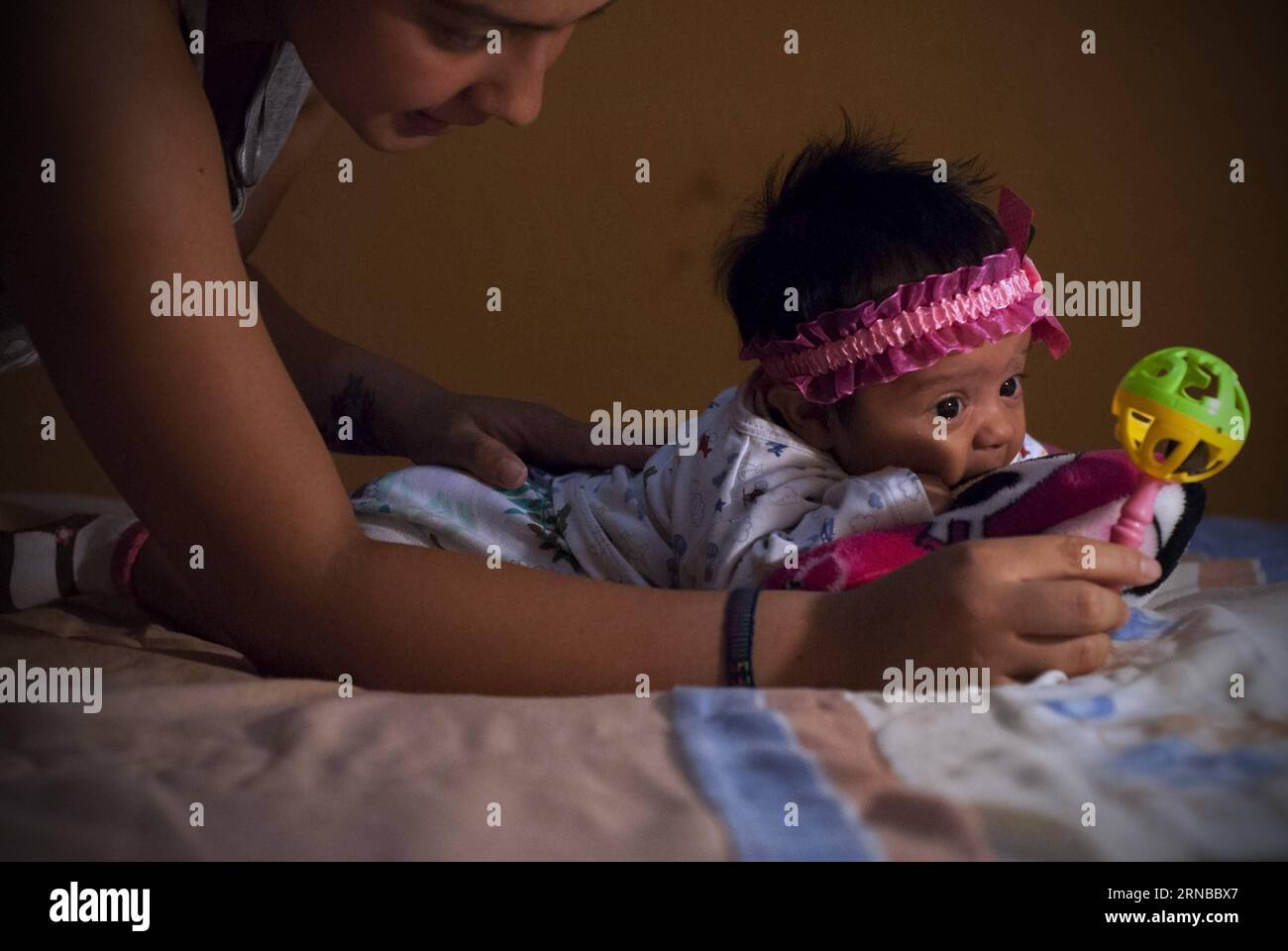 Image taken on Feb. 27, 2016 shows Angela Martinez, playing with her ...