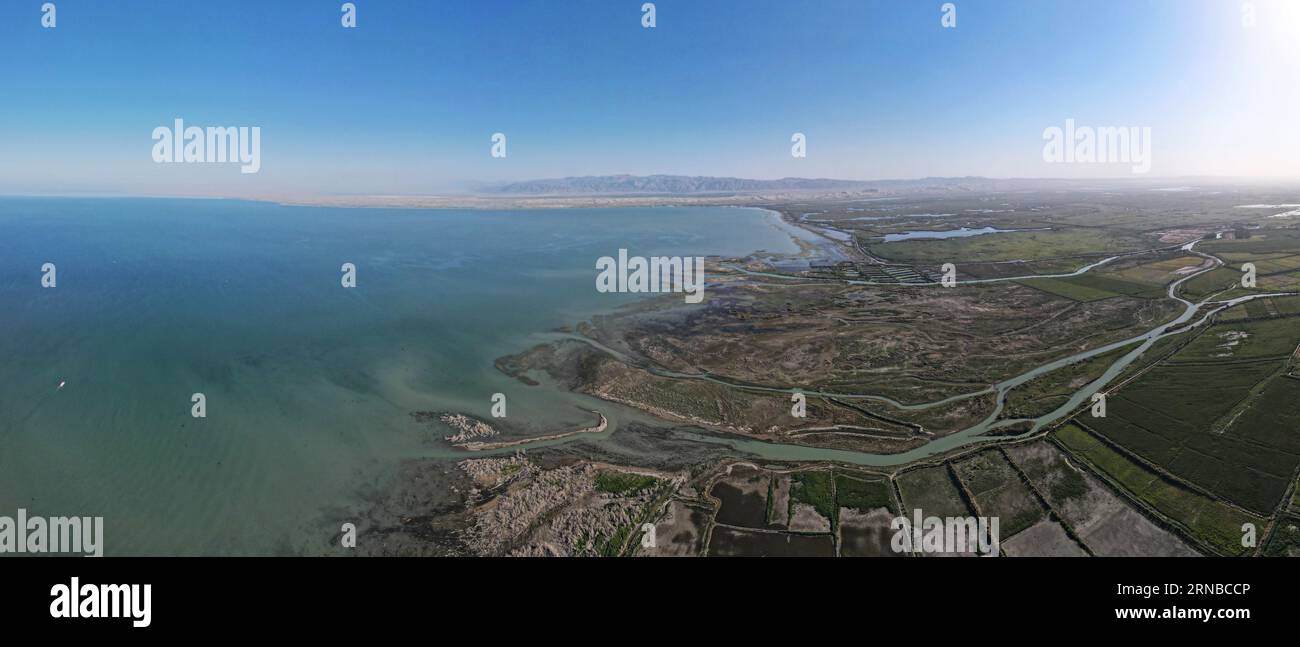 Urumqi. 31st Aug, 2023. This aerial panoramic photo taken on Aug. 31 ...