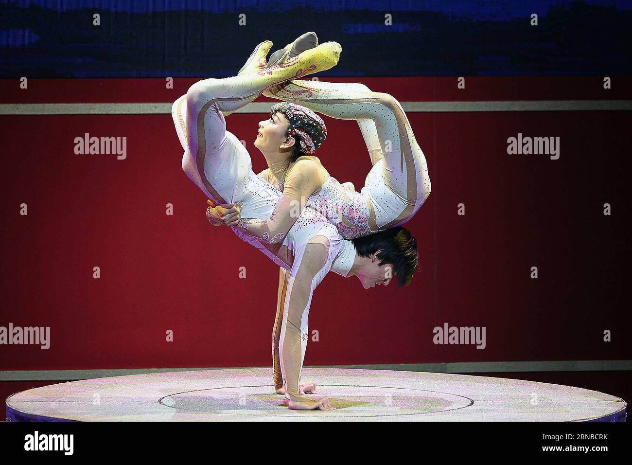 Acrobats of China s Guangdong Acrobatic Troupe perform during the ...