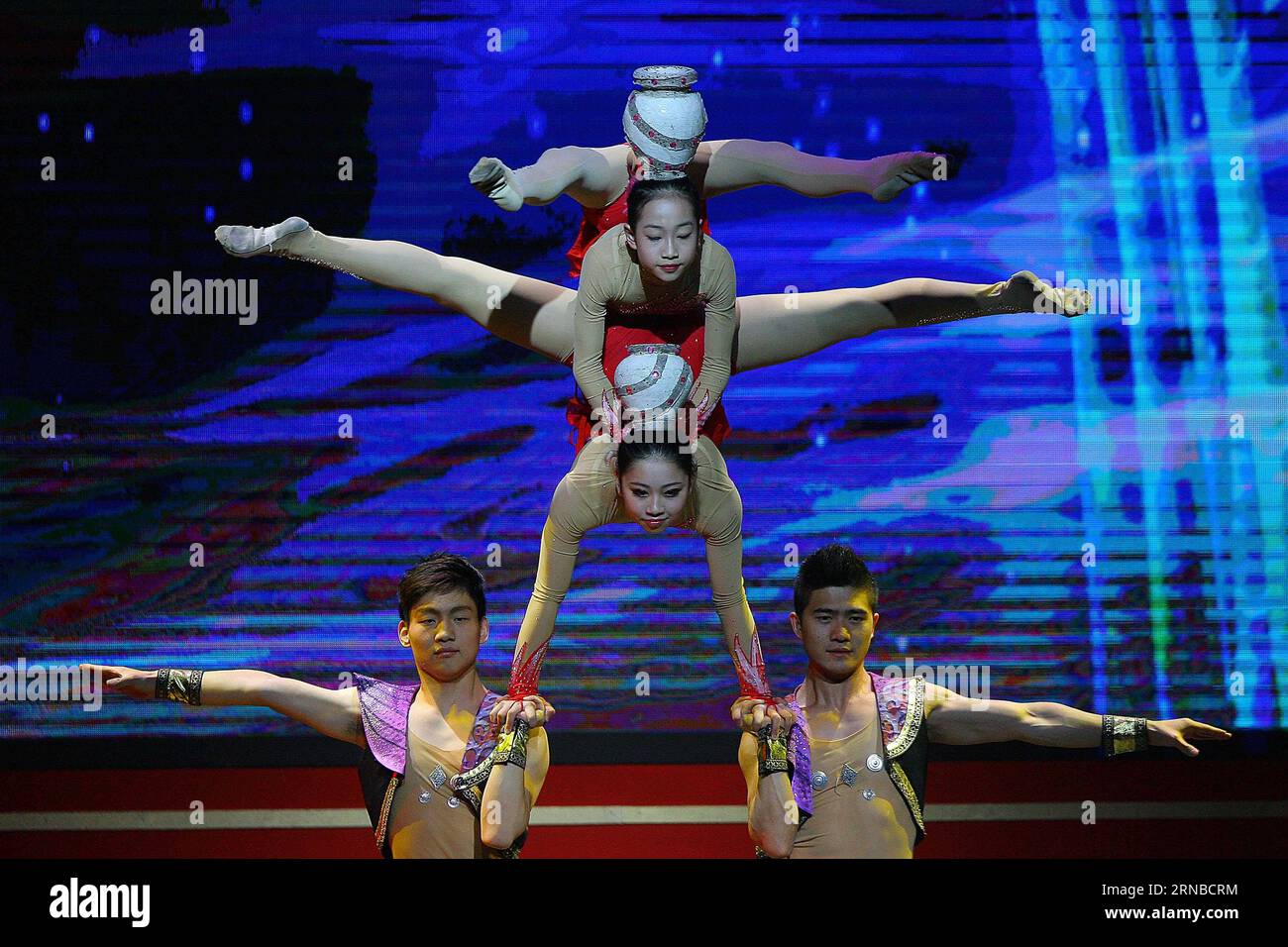 Acrobats of China s Guangdong Acrobatic Troupe perform during the ...
