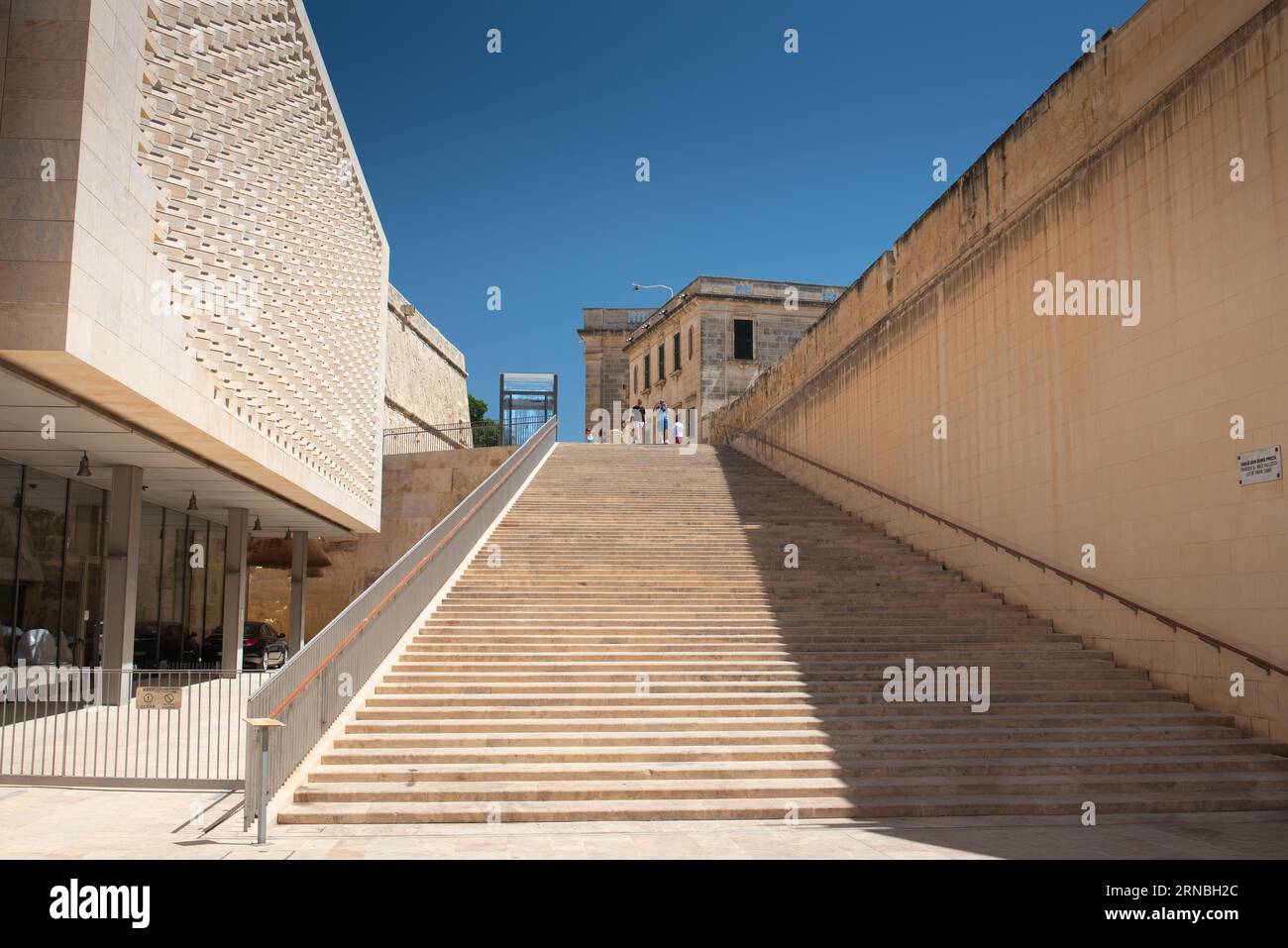 View of the grand stone staircase in the old town of Valetta, Malta ...