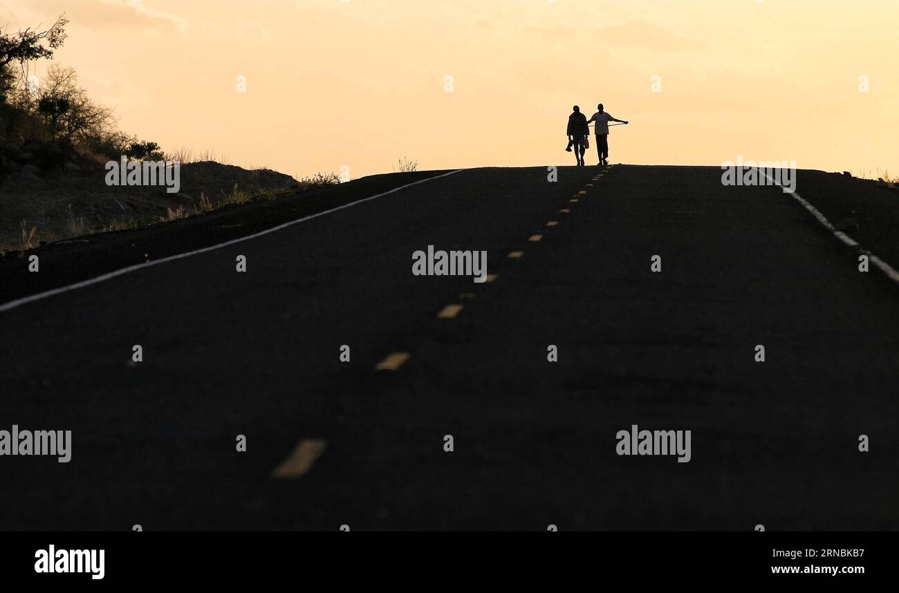 Local chinese residents walk hi-res stock photography and images - Alamy