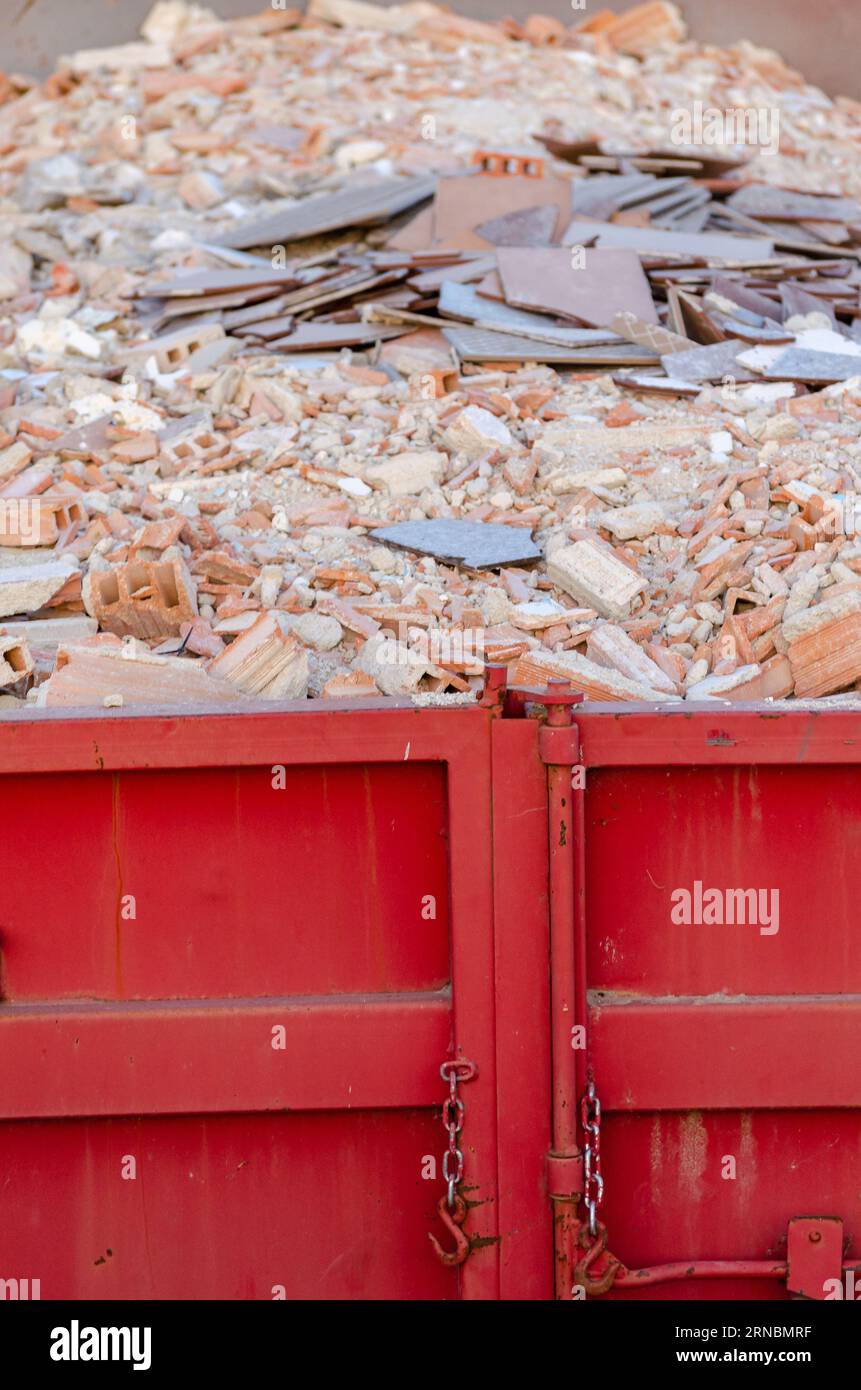 container full of construction debris Stock Photo - Alamy