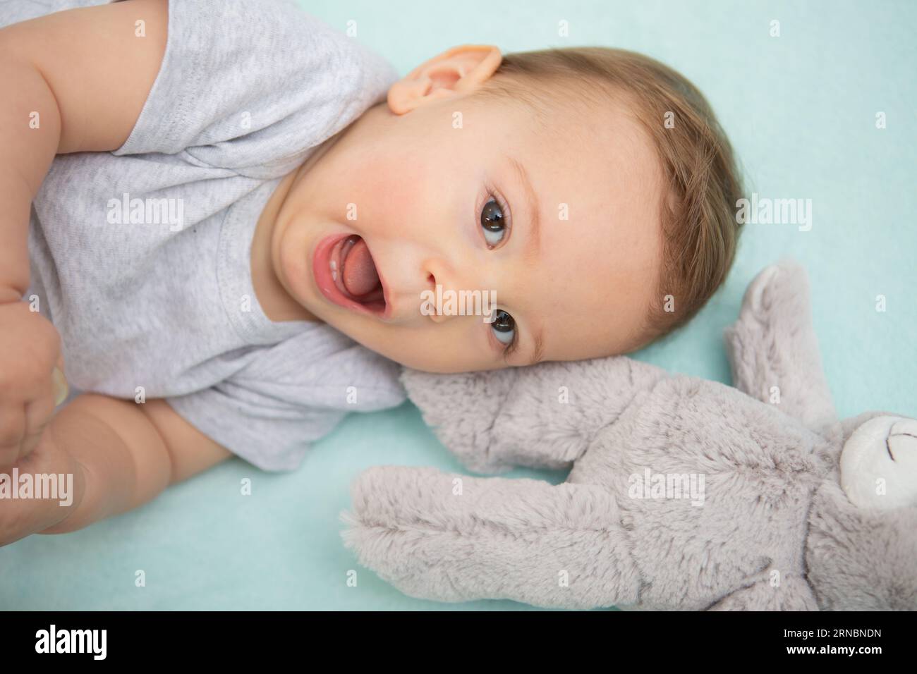 beautiful smiling cute baby at home Stock Photo - Alamy