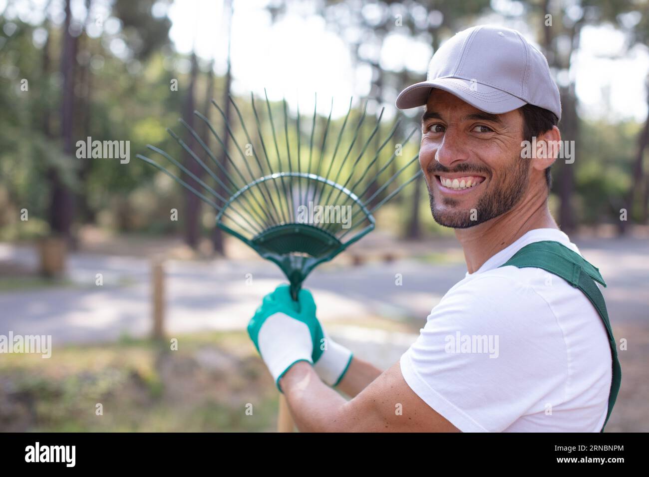 Raking up dead leaves hi-res stock photography and images - Alamy