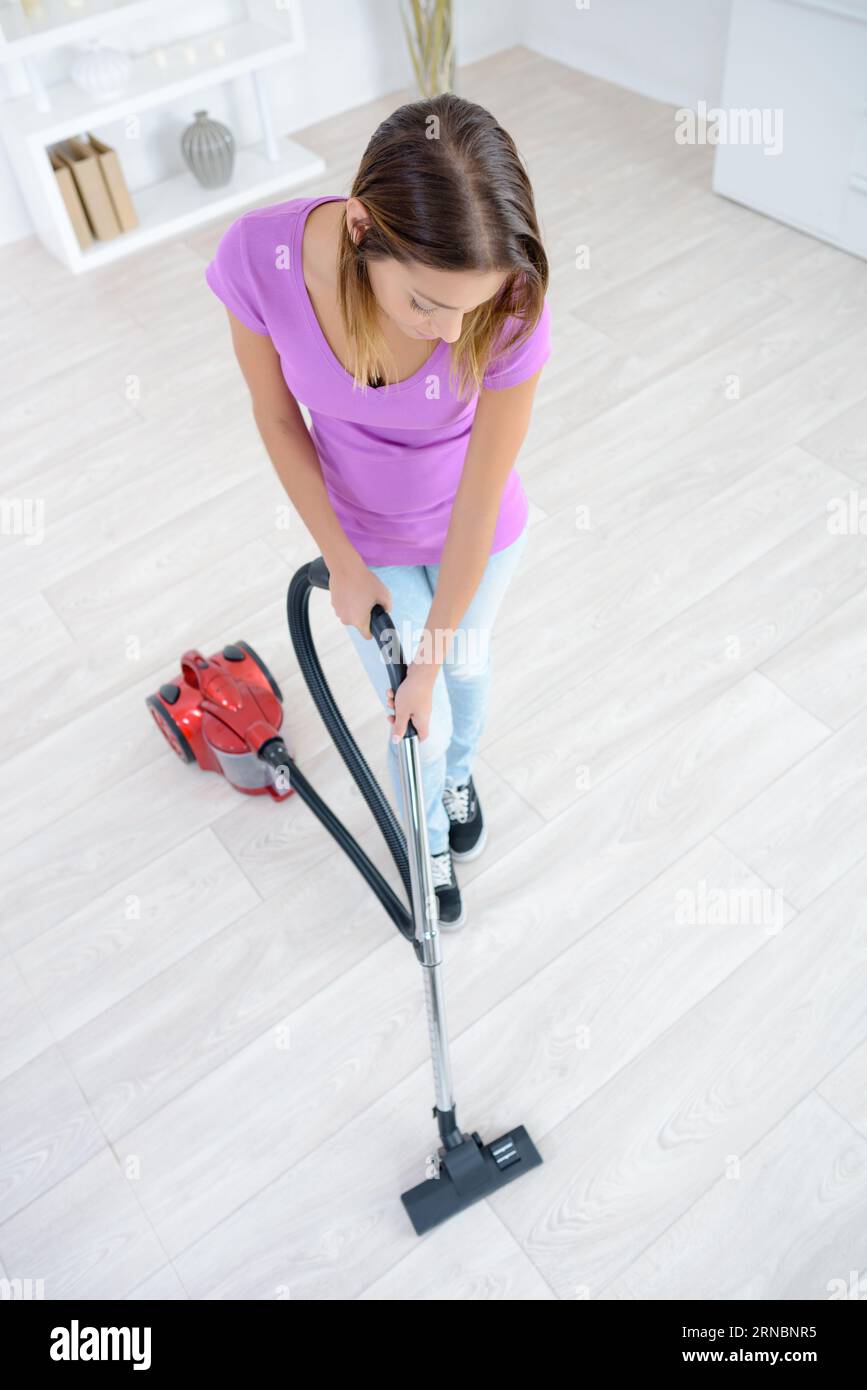 Woman hoovering hi-res stock photography and images - Alamy