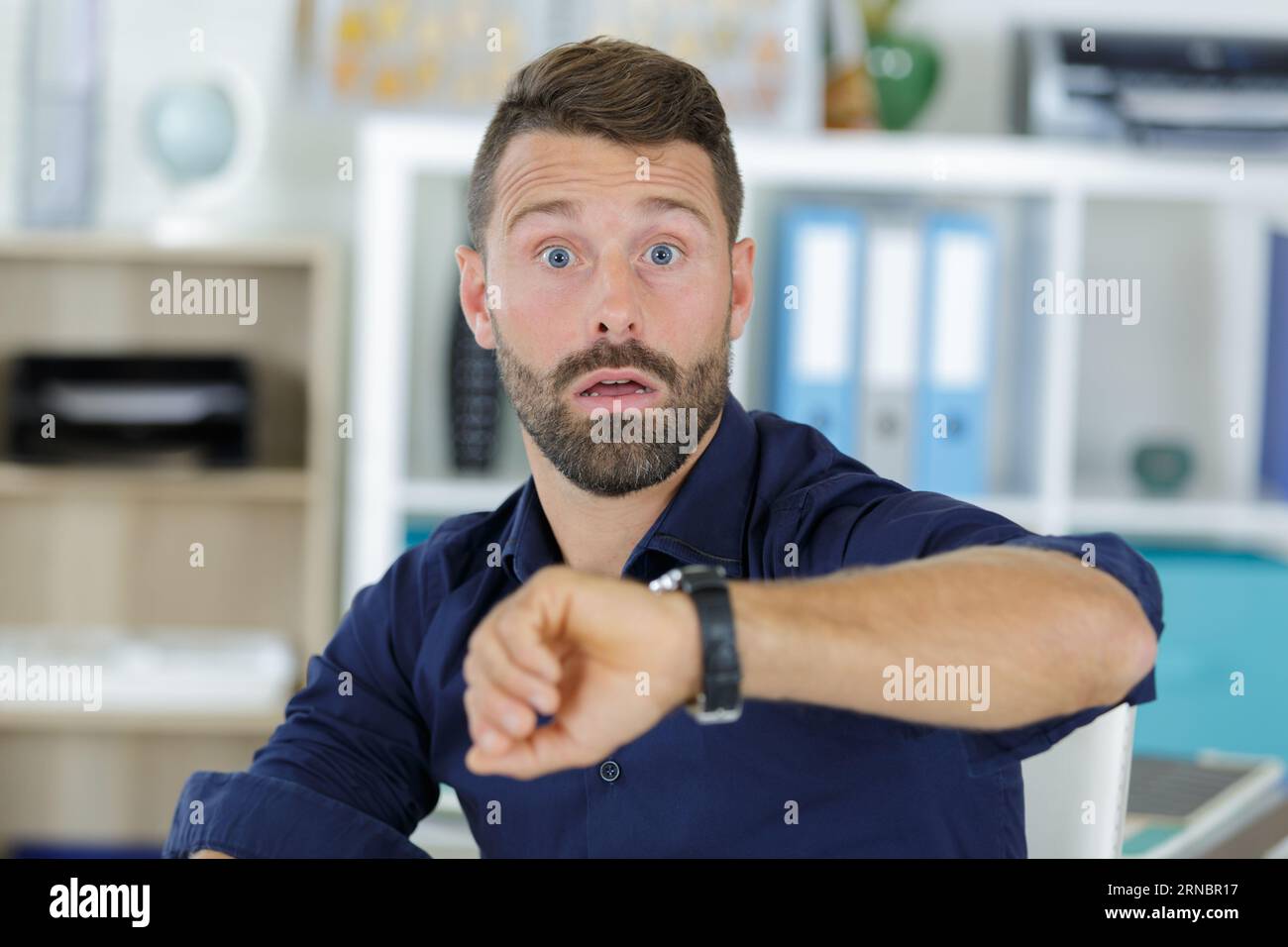 Man worried look watch hi-res stock photography and images - Alamy