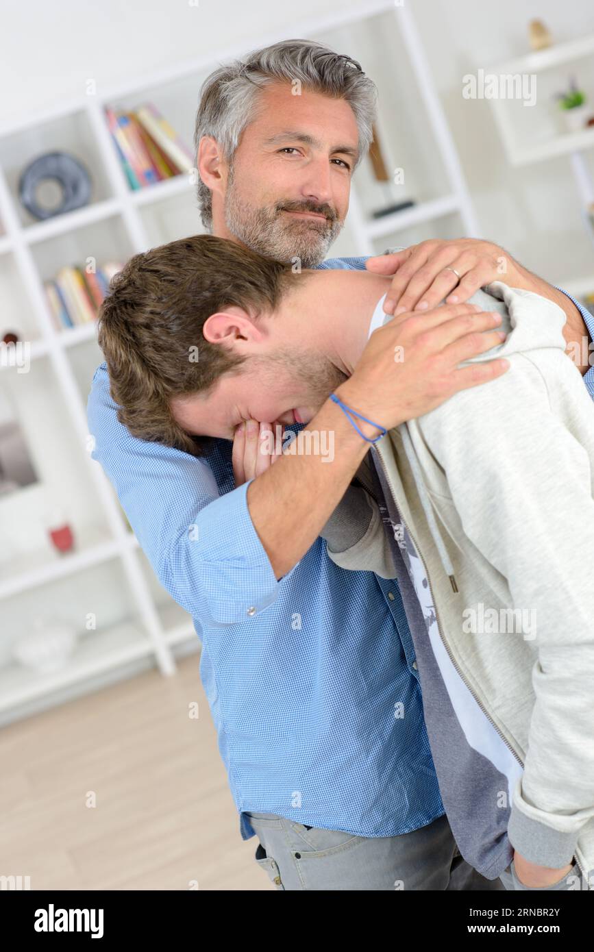 Sympathetic man crying hi-res stock photography and images - Alamy