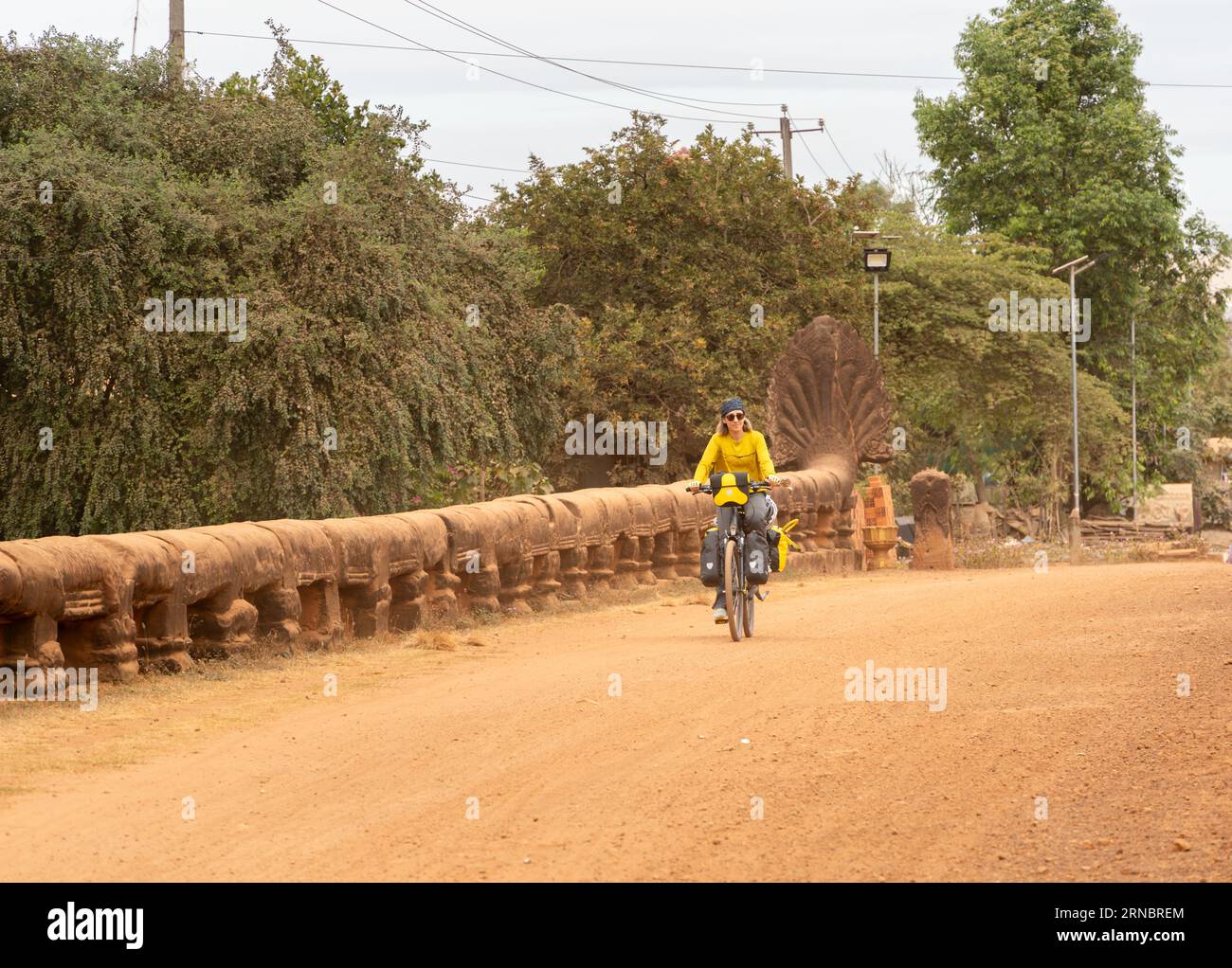 Cyclist passing through rural hi-res stock photography and images - Alamy