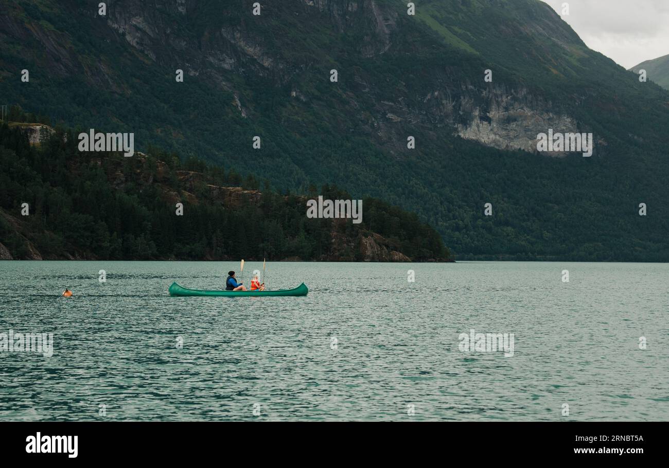 Family canoe sea hi-res stock photography and images - Alamy