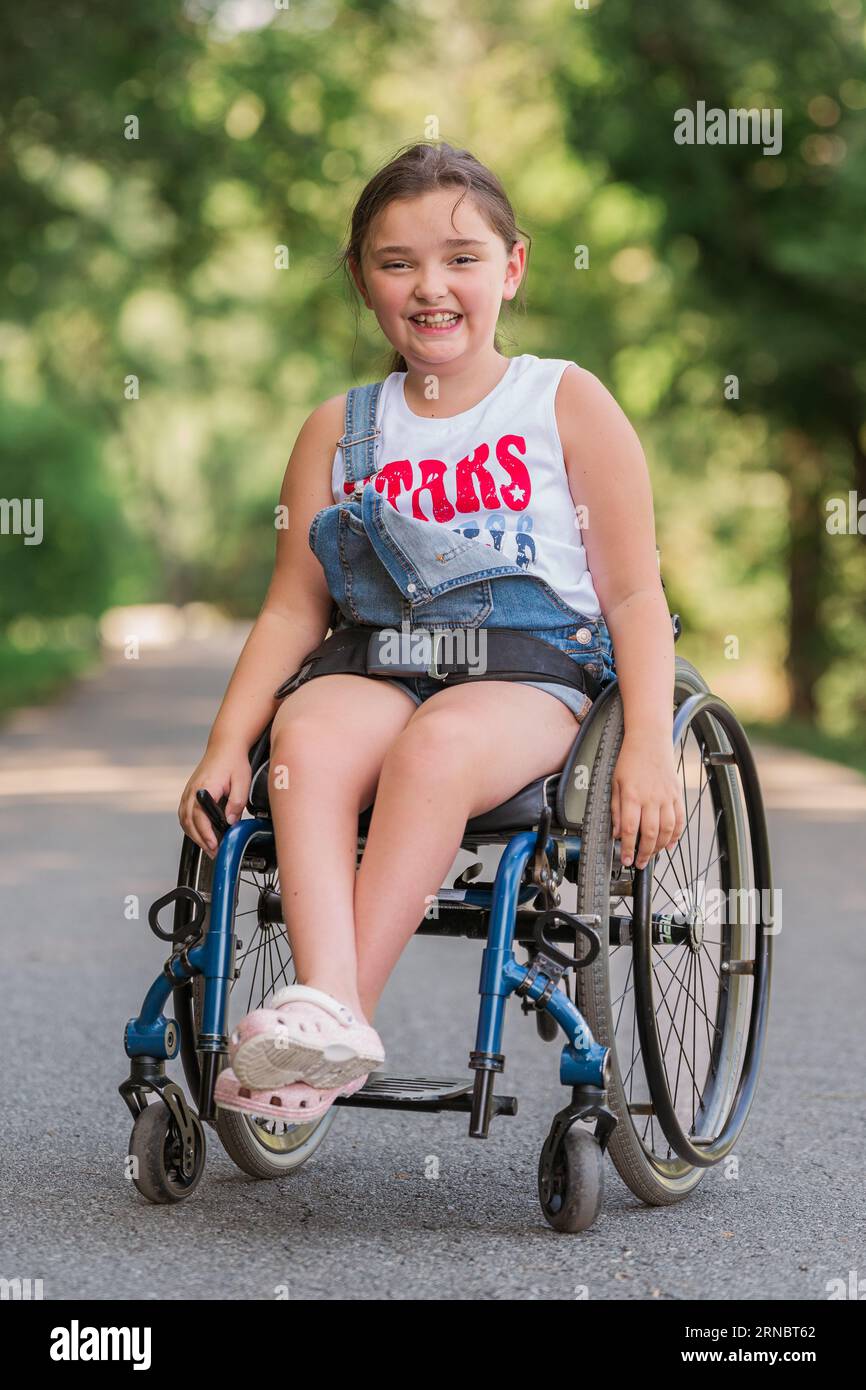 Lady with disability hi-res stock photography and images - Alamy