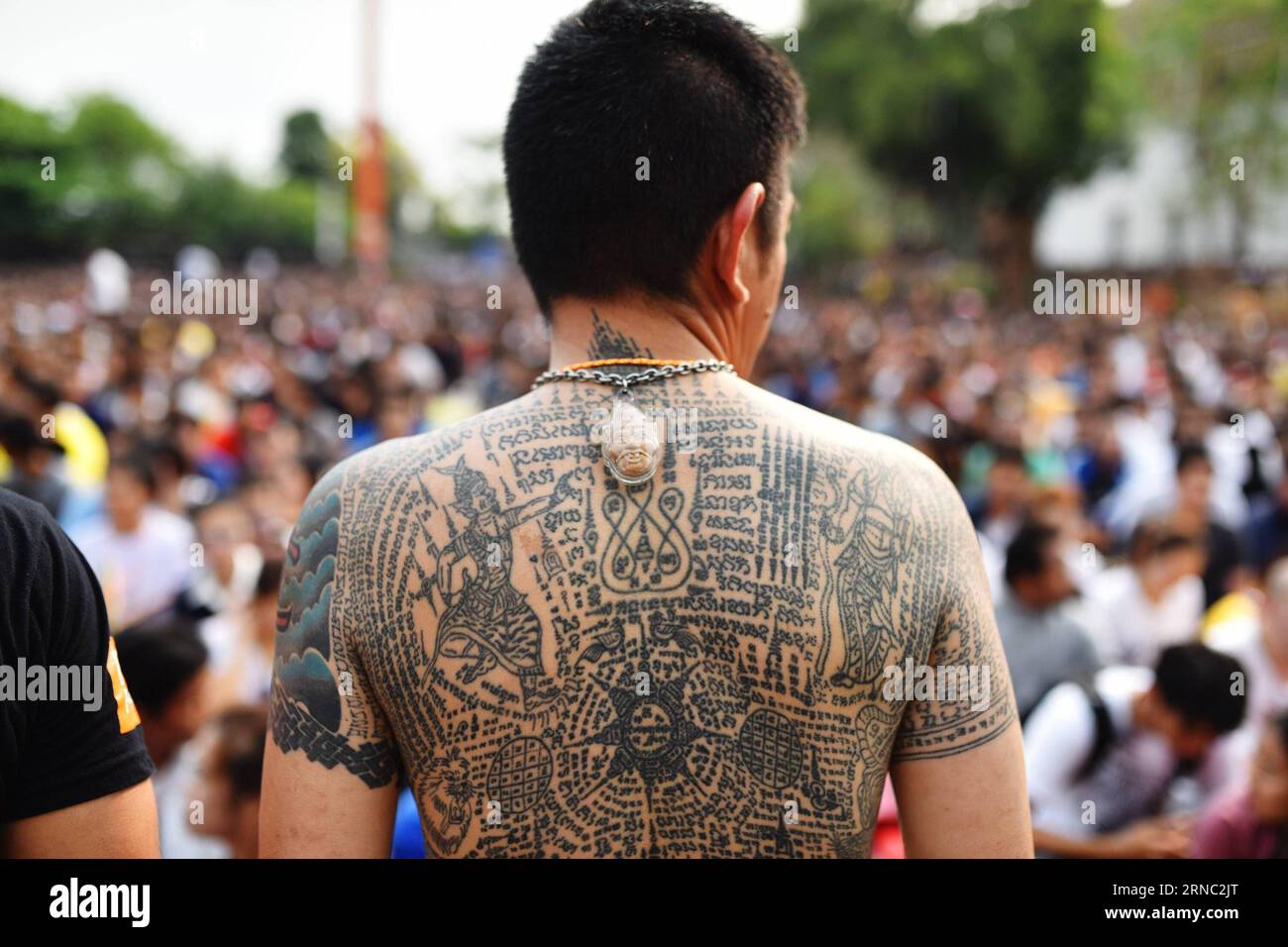 (160319) -- NAKHON PATHOM, March 19, 2016 -- A disciple is seen with ...