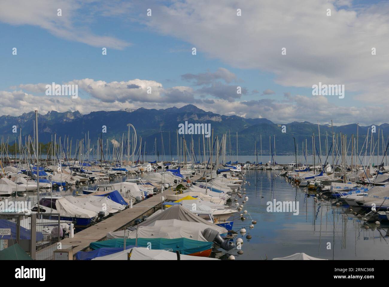 PORT DE OUCHY, SWITZERLAND - AUGUST 5, 2023: Swiss touristic harbor on ...