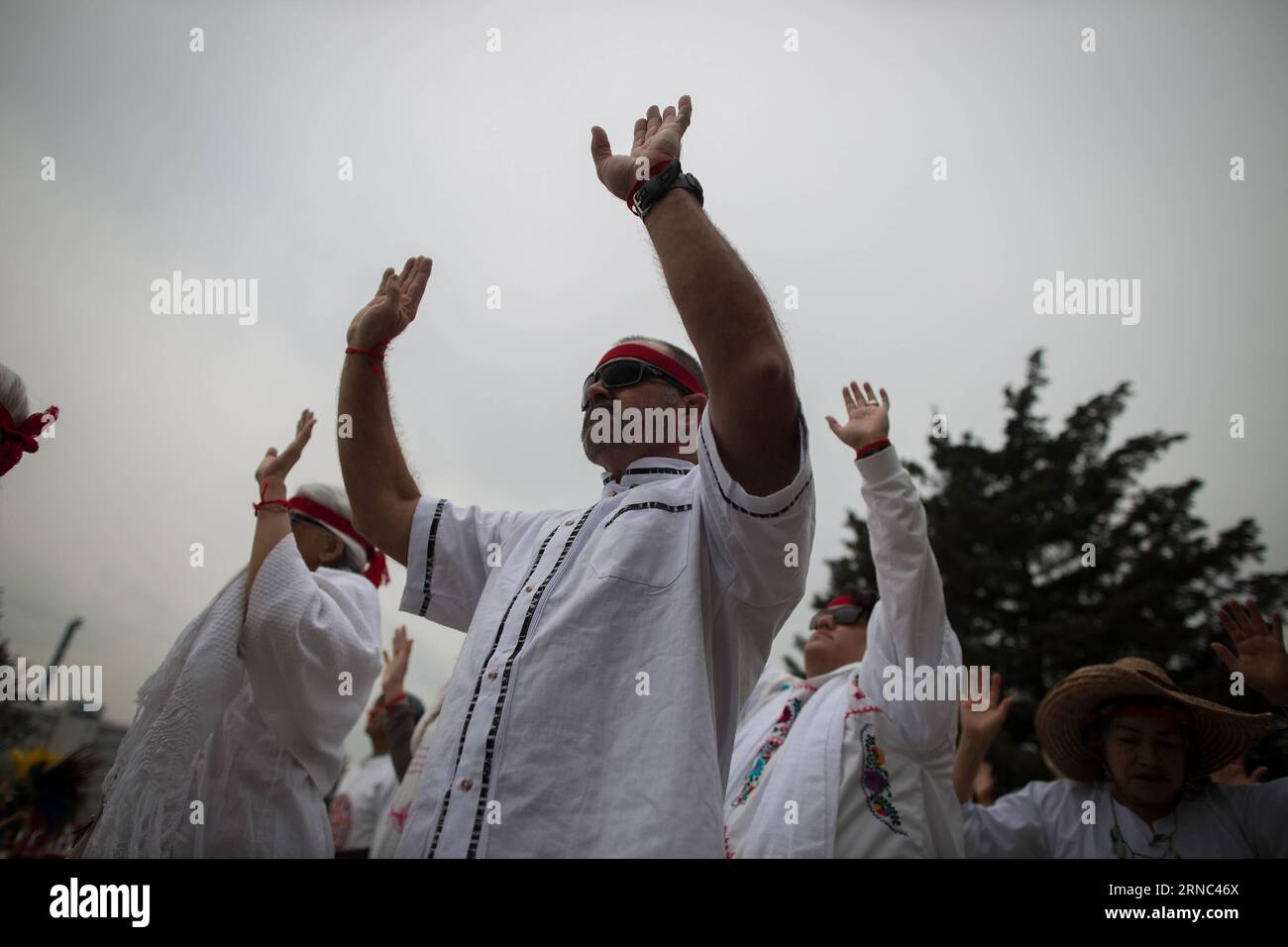 People take part in a ceremony to celebrate the spring equinox in the ...