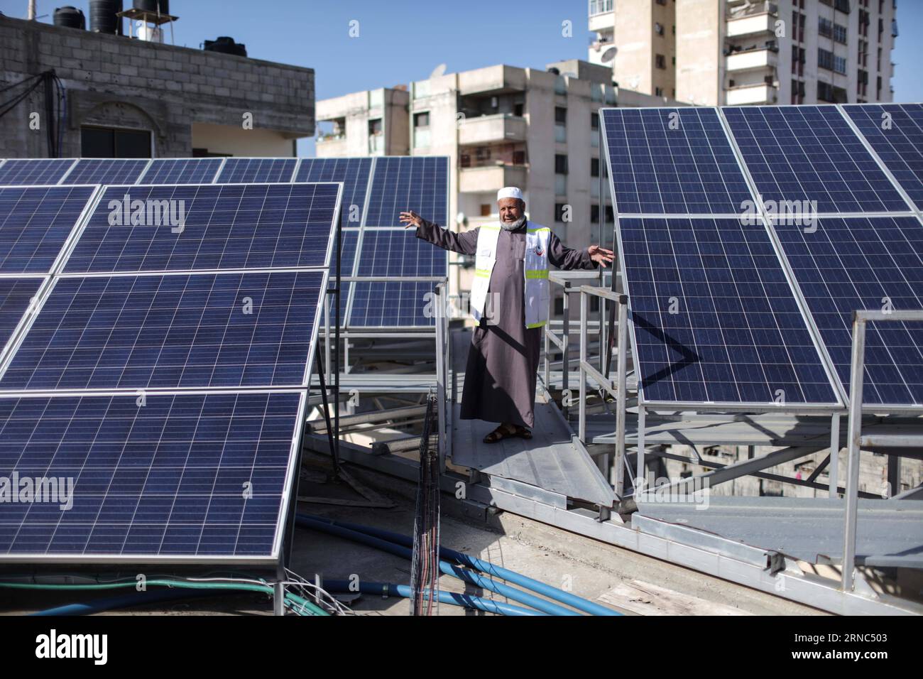 Rooftop solar panels are seen on the roof of a hospital, in Gaza City ...