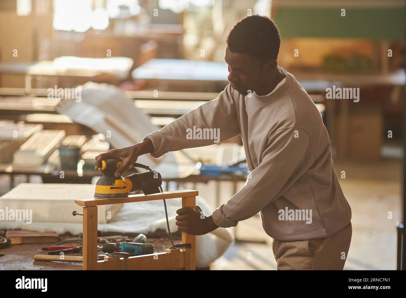 African carpenter cutting wooden hi-res stock photography and images ...