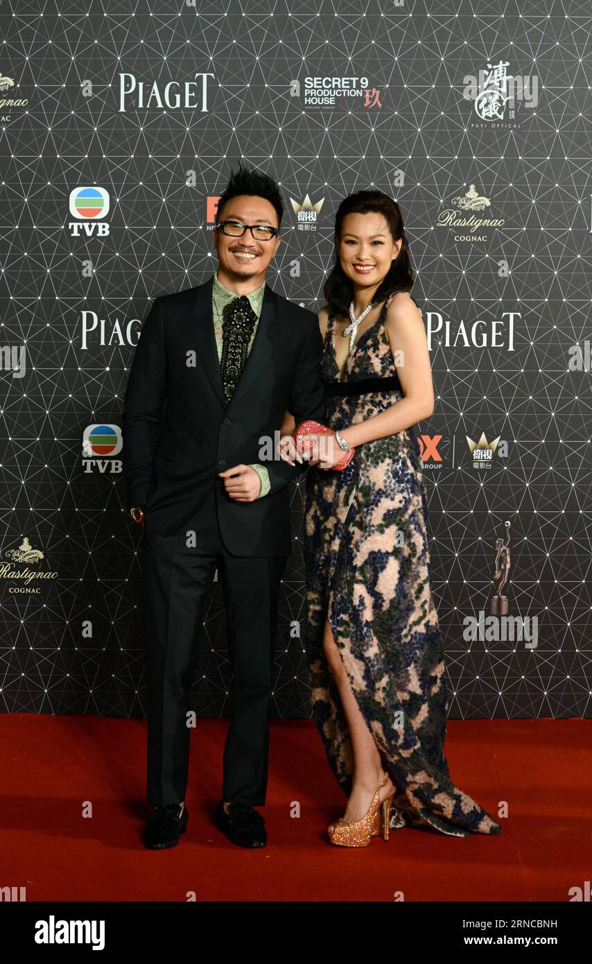 (160403) -- HONG KONG, April 3, 2016 -- Actor Ronald Cheng and his wife ...