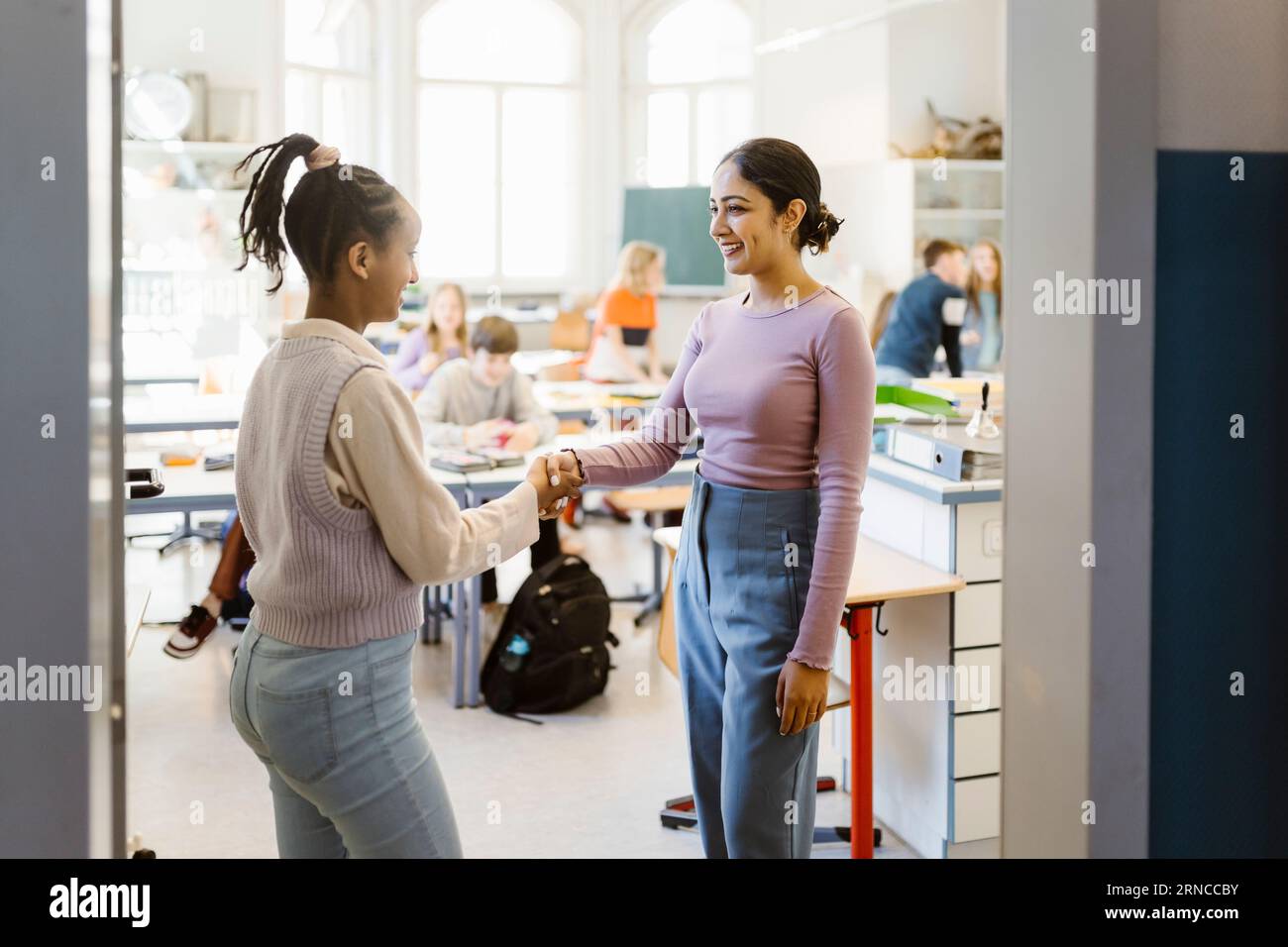 Handshake standing horizontal hi-res stock photography and images - Alamy