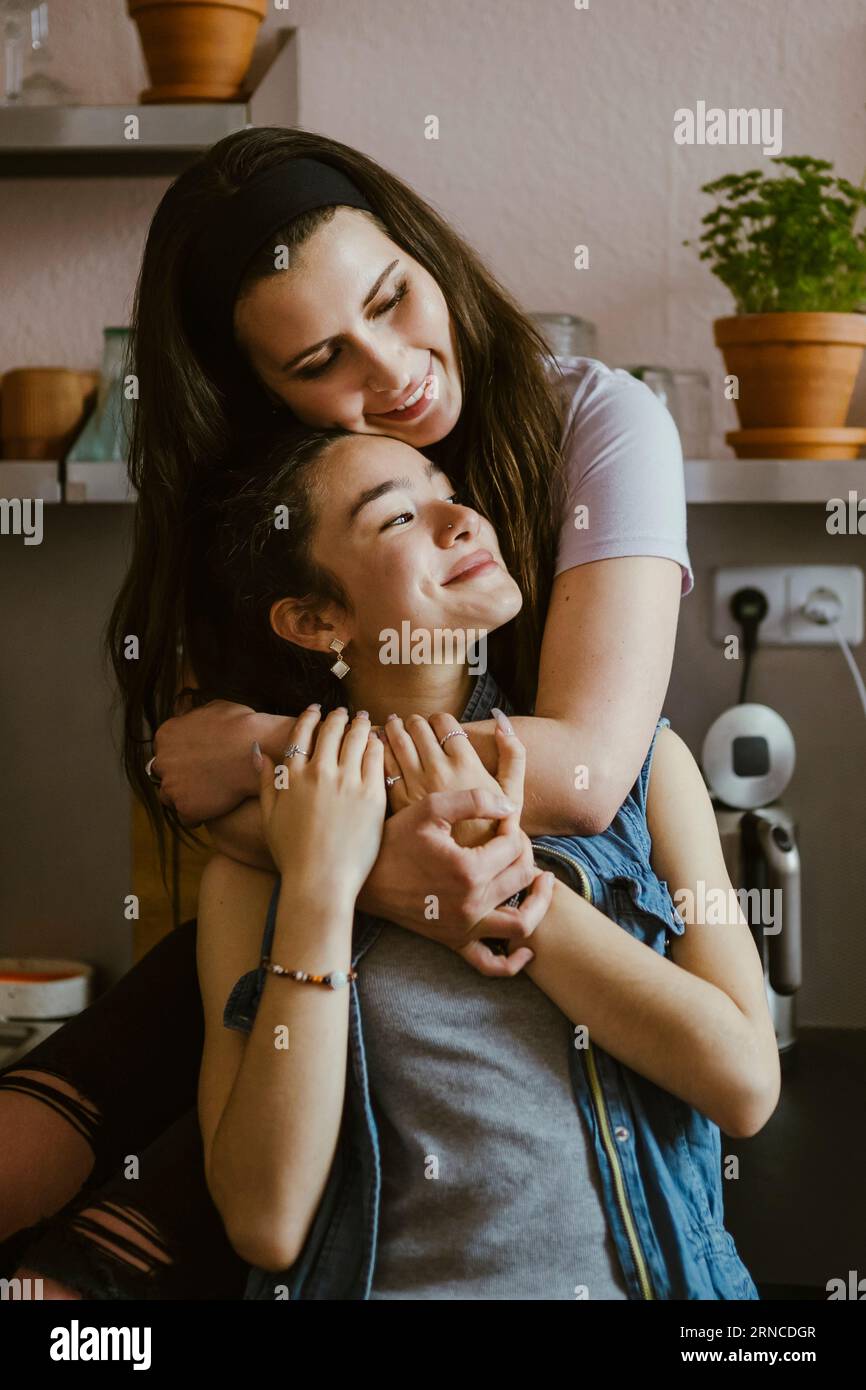 Indian two friends hugging smiling hi-res stock photography and images ...