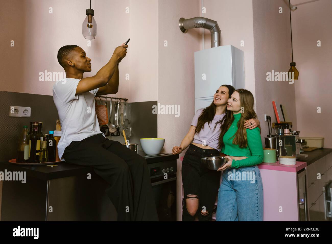 Man sitting at counter hi-res stock photography and images - Alamy