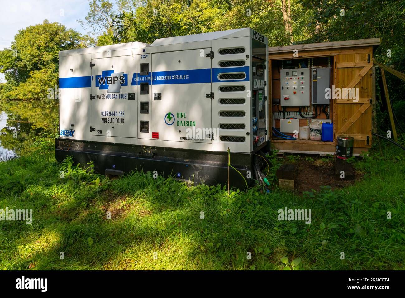 Kohler electricity generator powering water pump, loam pond fishing ...