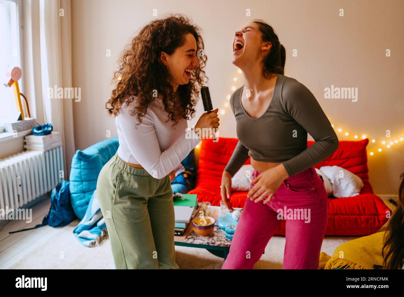Singing into hairbrush hi-res stock photography and images - Alamy