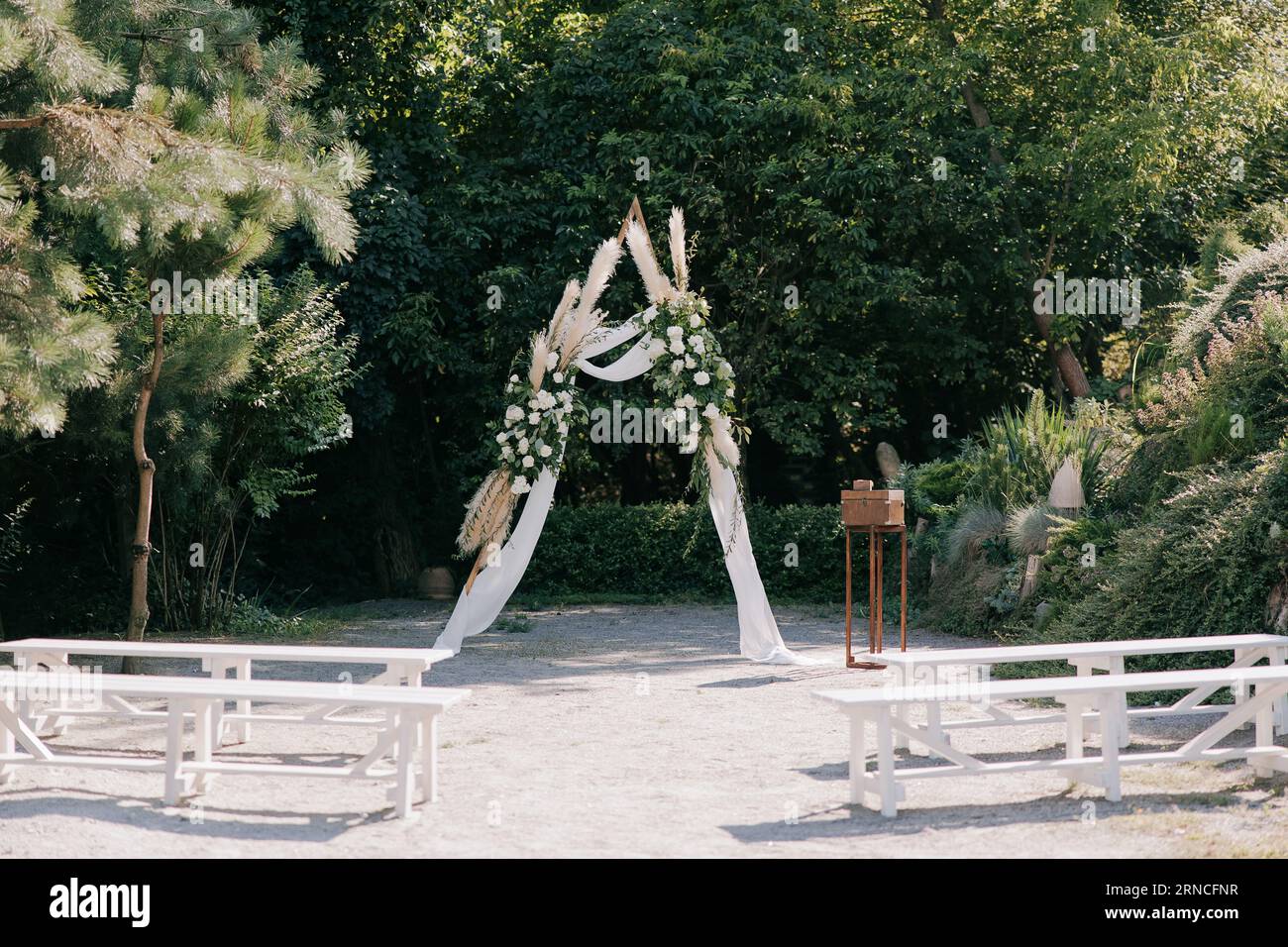 Wedding ceremony in the beautiful landscaping garden with stylish ...