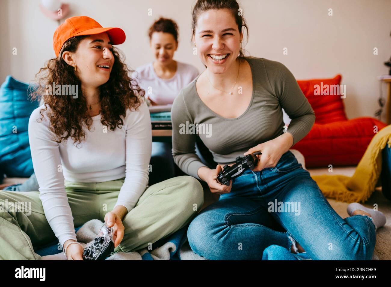 Happy smiling friends playing hi-res stock photography and images - Alamy