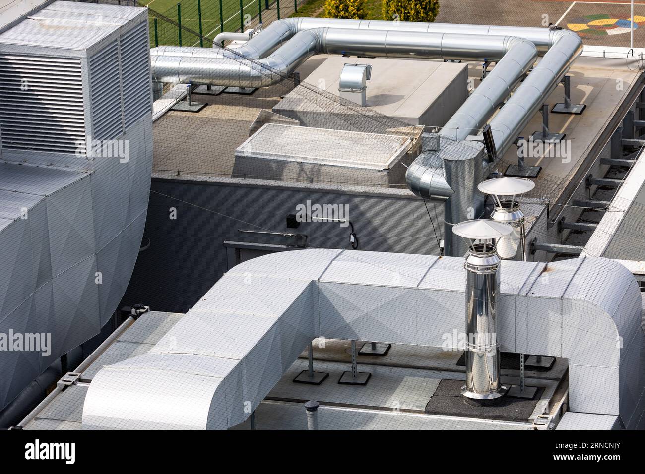Ducts of the ventilation and air conditioning system on the roof of the ...