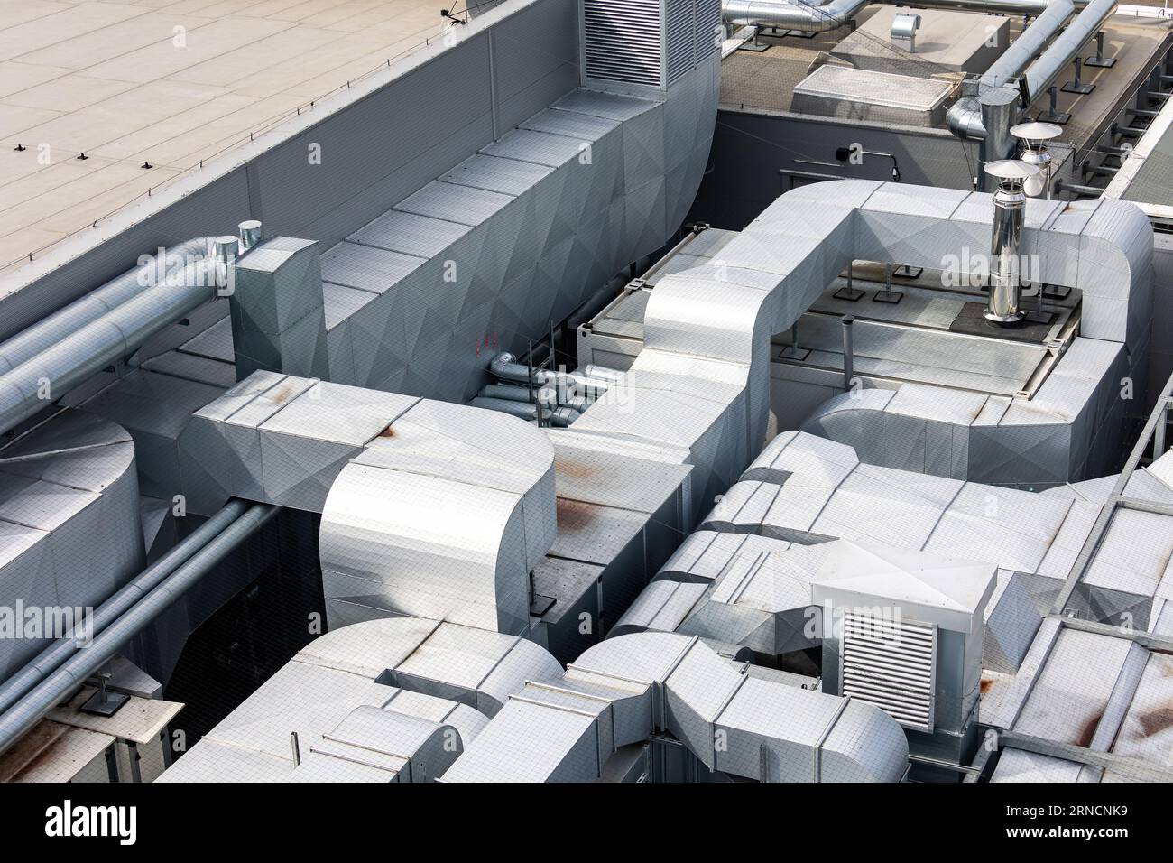 Ducts of the ventilation and air conditioning system on the roof of the ...