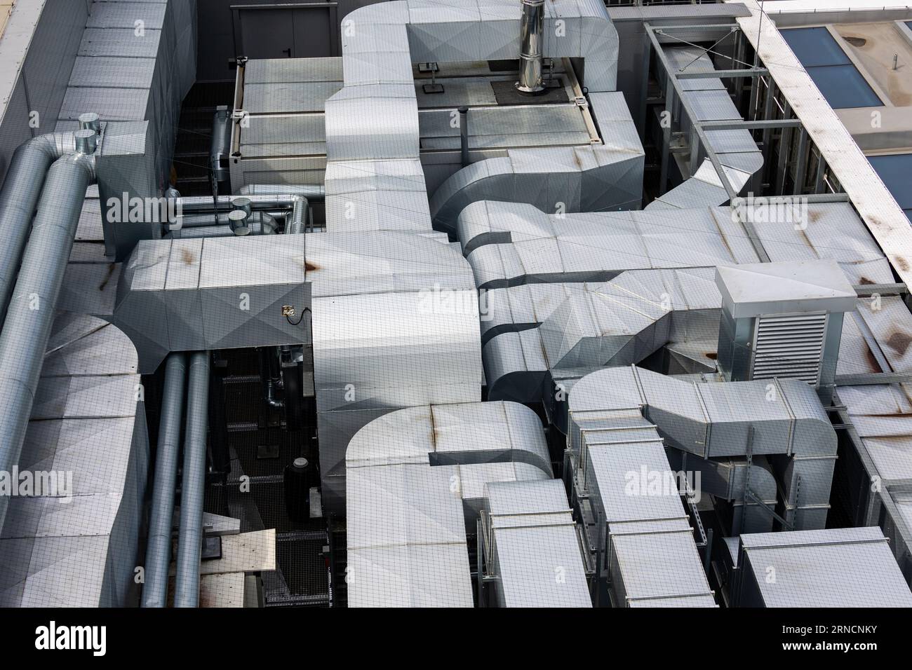 Ducts of the ventilation and air conditioning system on the roof of the ...