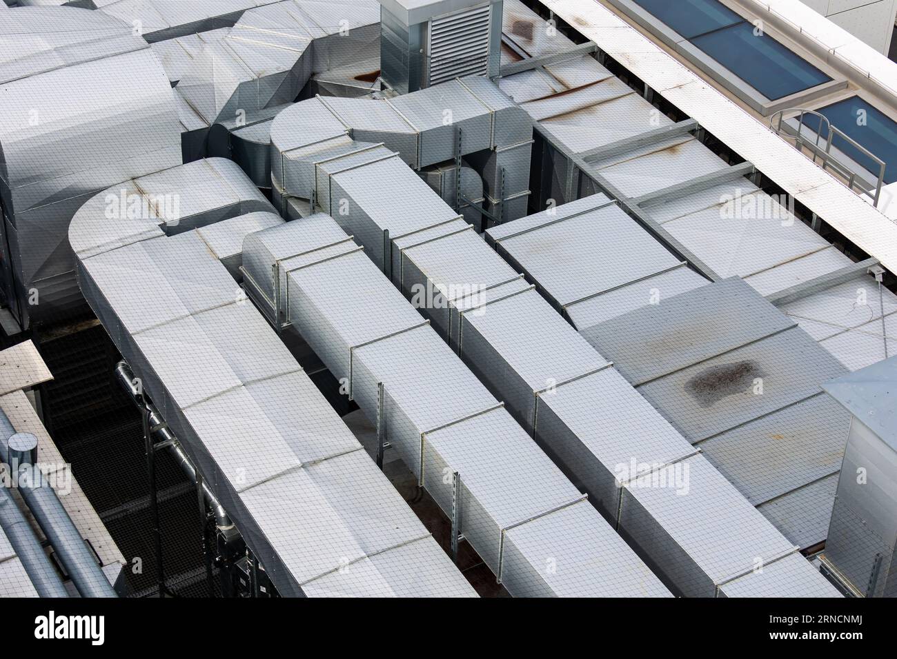 Ducts of the ventilation and air conditioning system on the roof of the ...